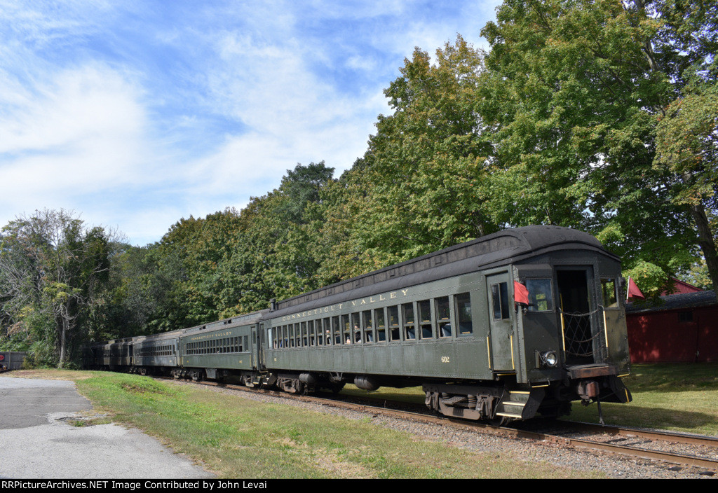 An Ex-Lackawanna Coach Trailing on the Rear of the Steam Train