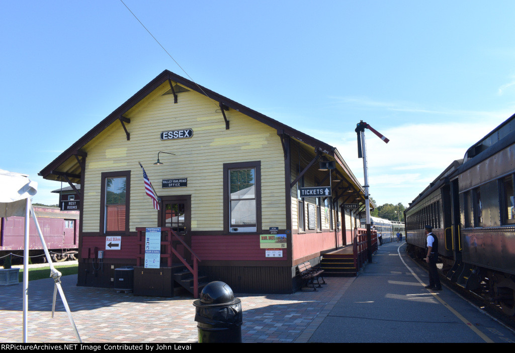 The Essex Depot Building with an old fashioned semaphore along with the ...