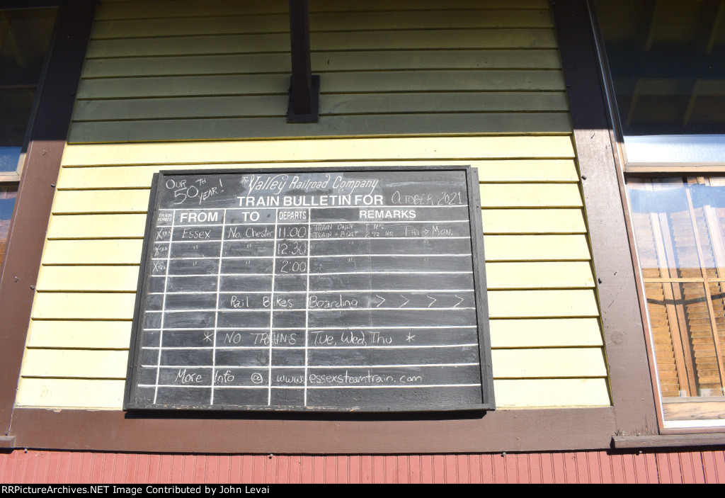 An old NH Display board at the Essex Depot that lists the times of the ...