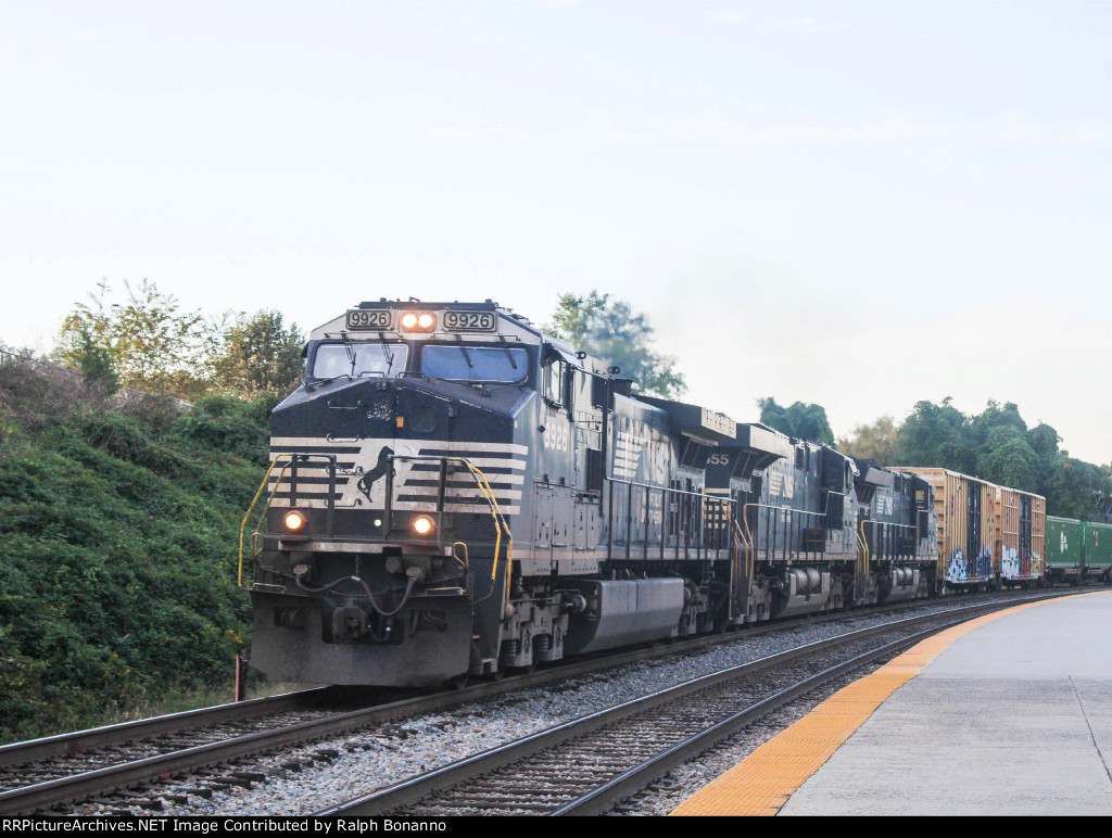 Southbound train 211 heads through the station bound for Atlanta