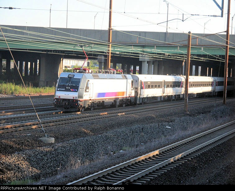 Morning local to New York gets a shove from one of NJ Transits ALP-46 ...