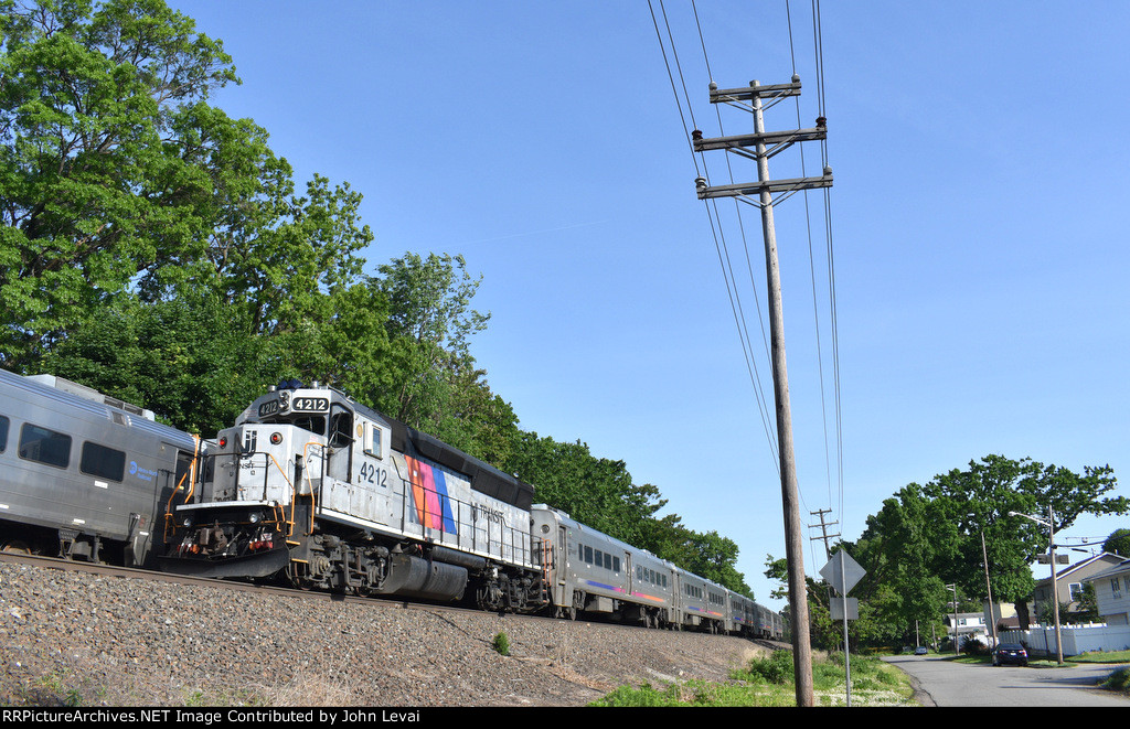 NJT GP40PH-2 # 4212 pushes an eastbound NJT deadhead train away from ...