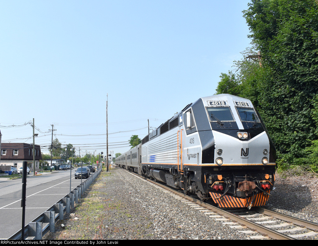 The first revenue westbound NJT train of the day arrives.