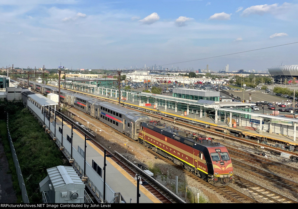 NJT ALP-46A # 4636 in the PRR colors leads a westbound Multilevel Set