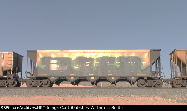 EB Empty Unit Open Hooper car Frt at Erie NV -80