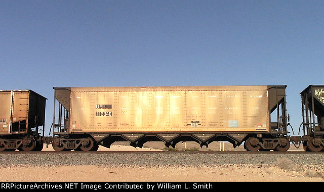 EB Empty Unit Open Hooper car Frt at Erie NV -85