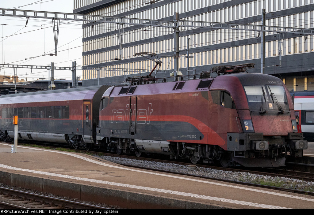 An OBB "Railjet" departs Zurich in the late afternoon