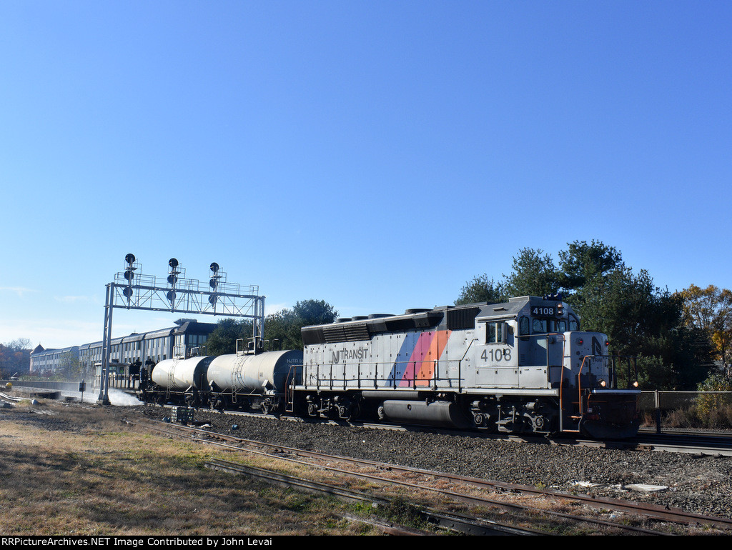 The Aqua Train heads west past the Waldwick Depot with GP40PH-2 # 4108 ...