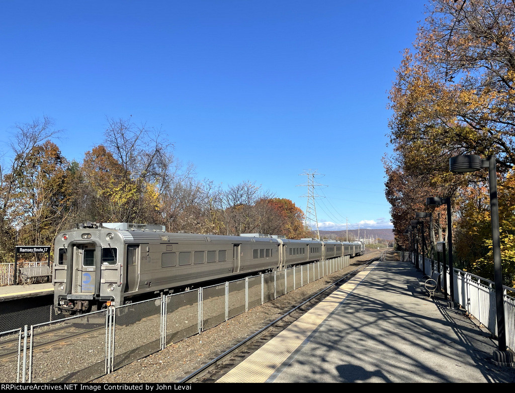 NJT Train # 74 arriving into the Ramsey Rt. 17 depot. The Ramapo Mtns ...
