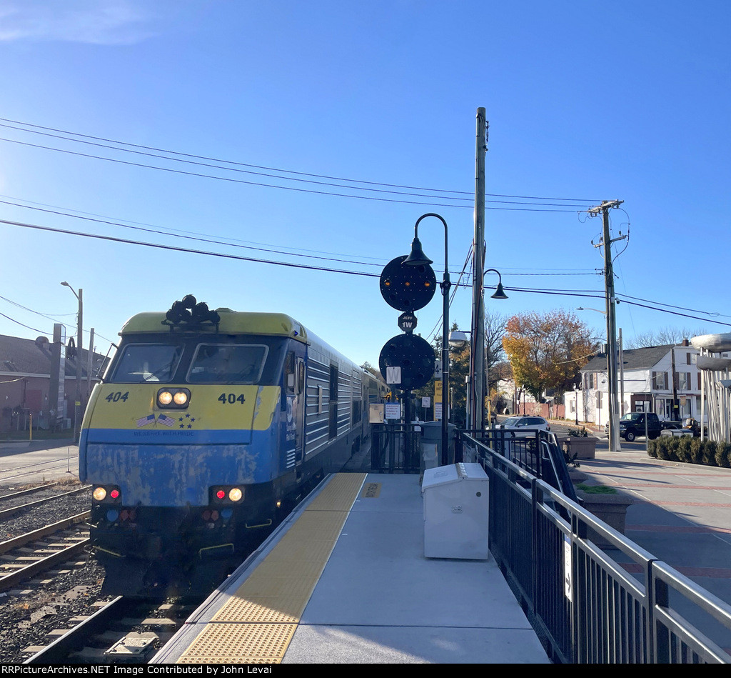 LIRR Train # 6650 enters the terminus of the line behind a DE30AC. He ...