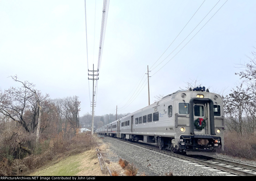 Now the first roundtrip of the day heads east with MNR Comet V Cab Car ...