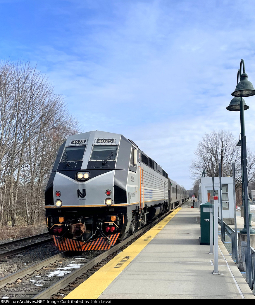 NJT Train # 73 arriving at the station behind PL42AC # 4025. I took ...
