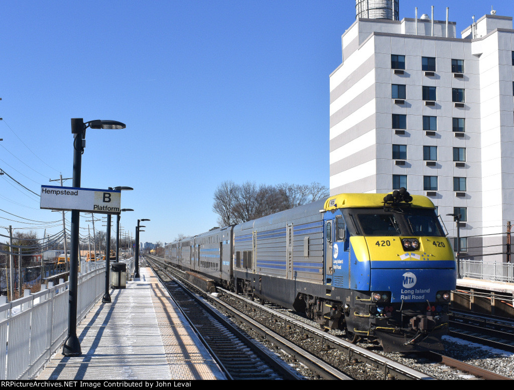 LIRR Train # 6512, with DE30AC as power, heads east