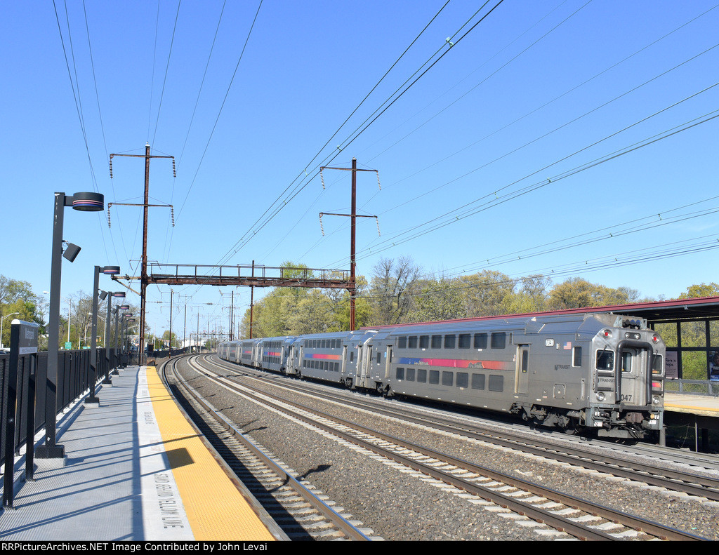 NJT Multilevel Cab Car # 7047 trailing on the rear of NJT Train # 3736