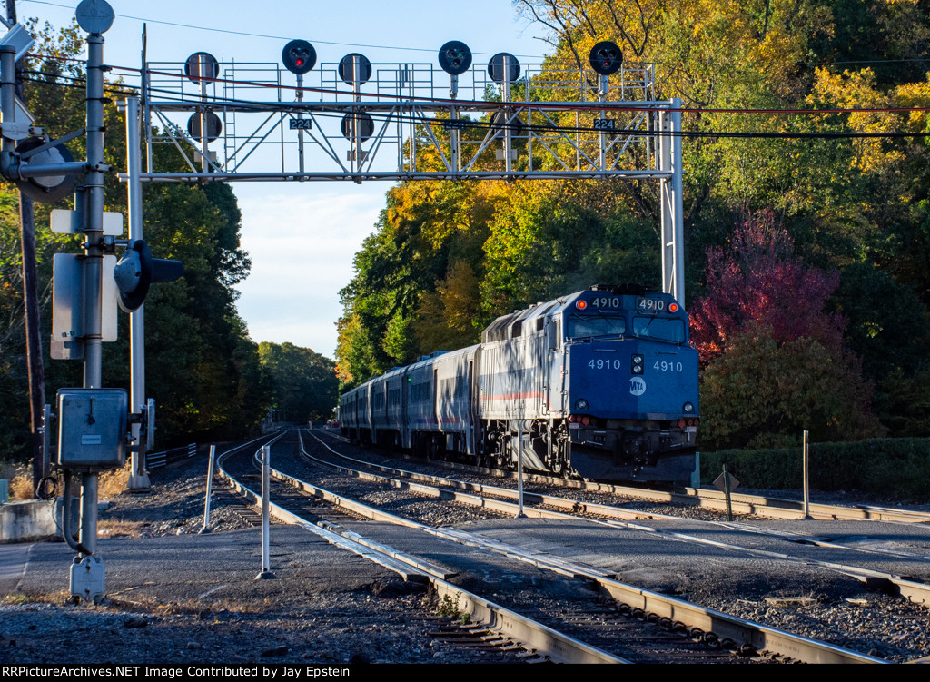 Inbound Train #54 passes under the signal bridge at Hollywood Ave