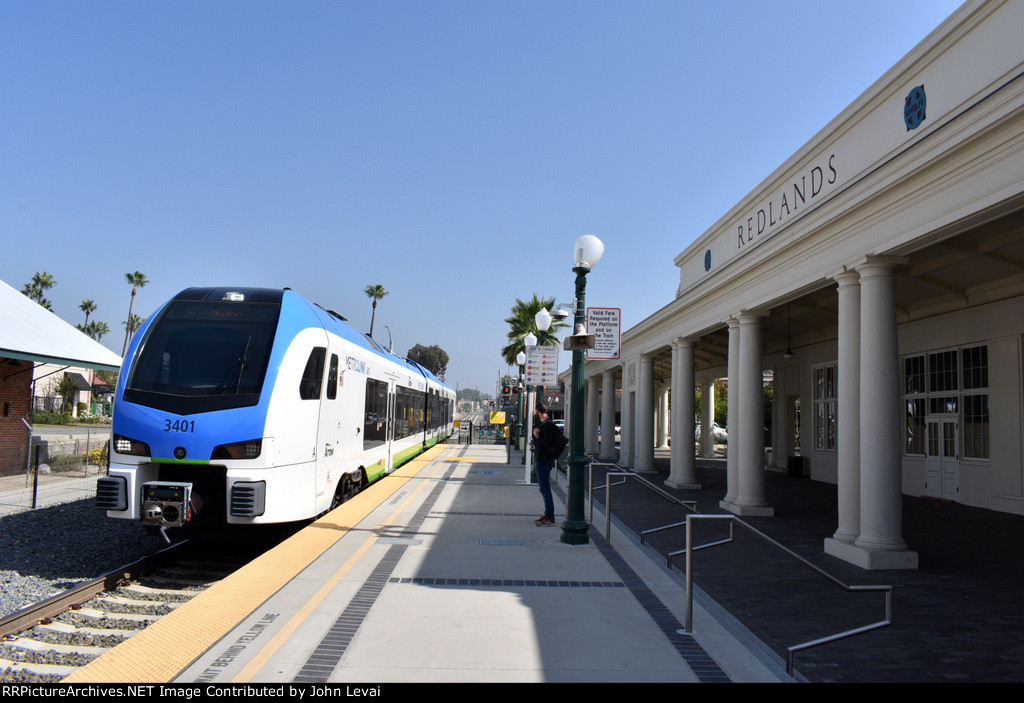 An early afternoon westbound coming into Redlands-Downtown Station with ...