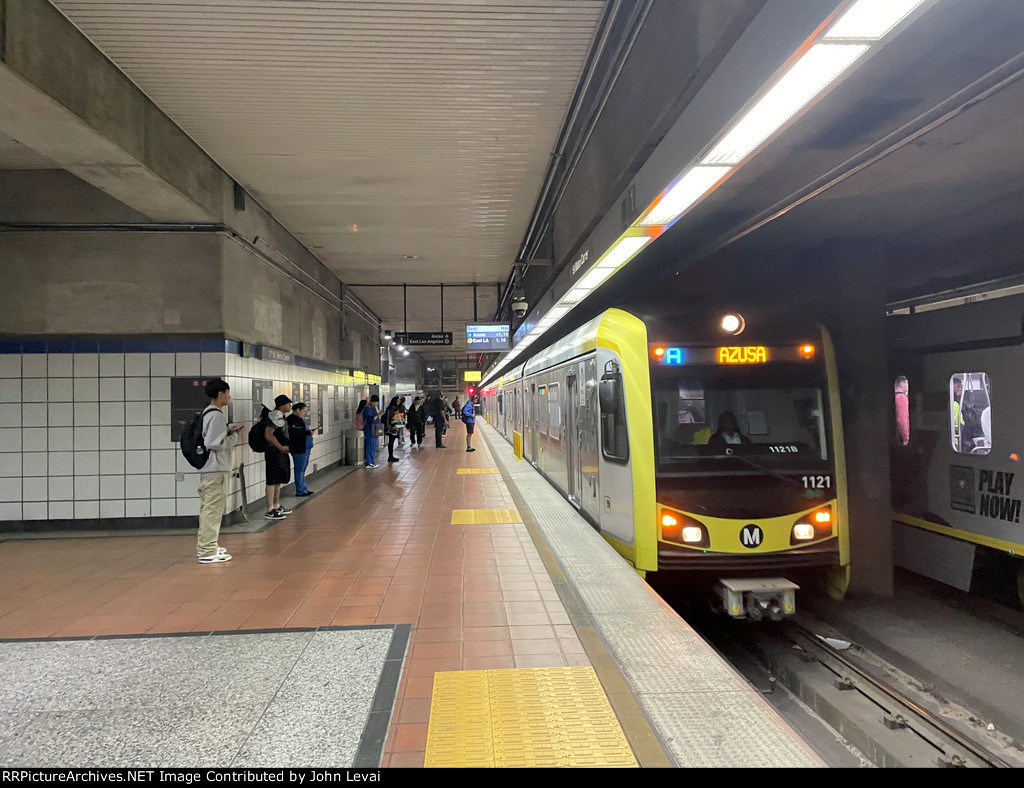 An Azuza bound LACMTA Light Rail A Line train is about to stop at 7th ...