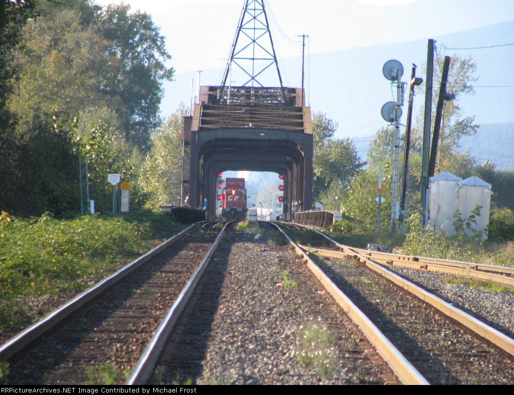 Westward view of the Pitt River rail bridge