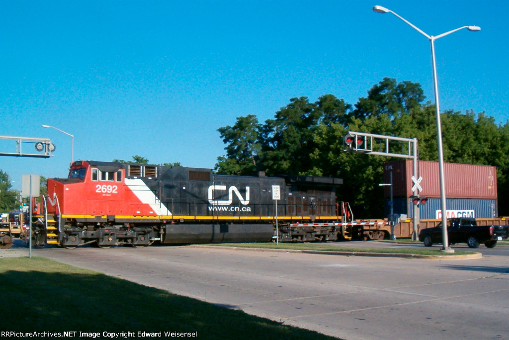 CN 2692 hauls the center of the steel-wheeled land barge
