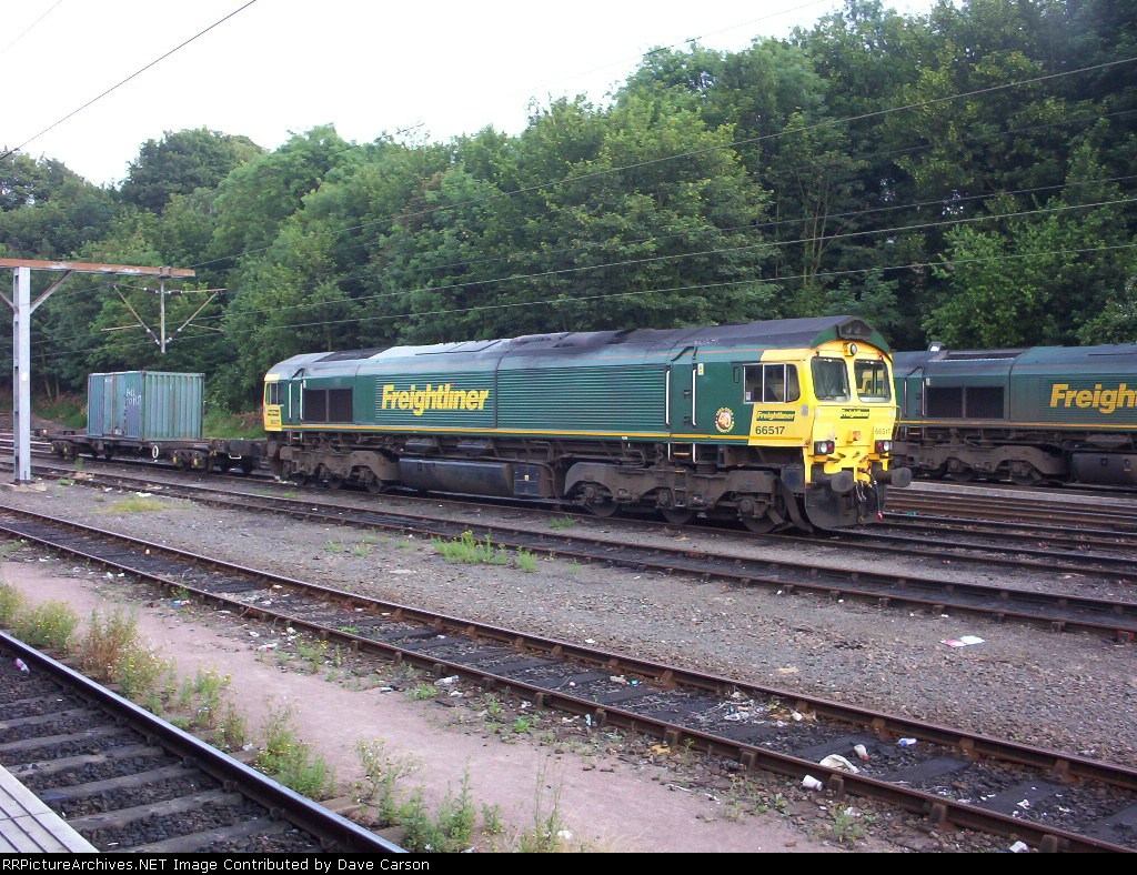 Freightliner loco 66517 and depot stores container flat by Ipswich ...