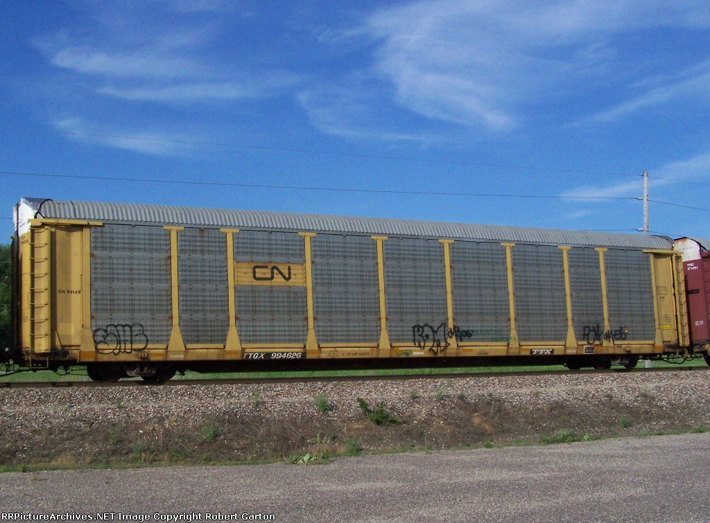 TTX Company Autorack Flat with Canadian National Topper