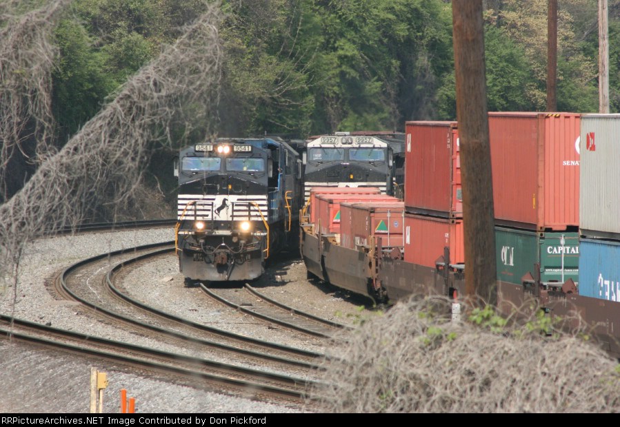 NS 9541 "C40-9W" heads south after swapping its crew as NS 9957 passes ...