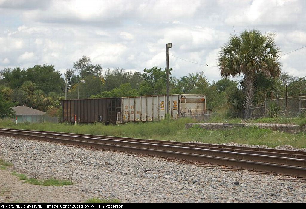 View of Open Hopper Cars set out on a CSX Transportation customer siding
