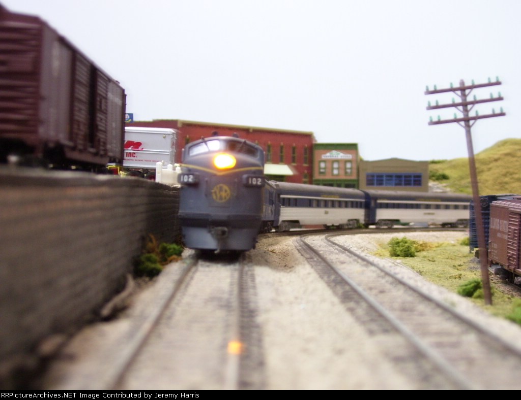 N&WR 102 at Hankinsville setting off and picking up passengers.