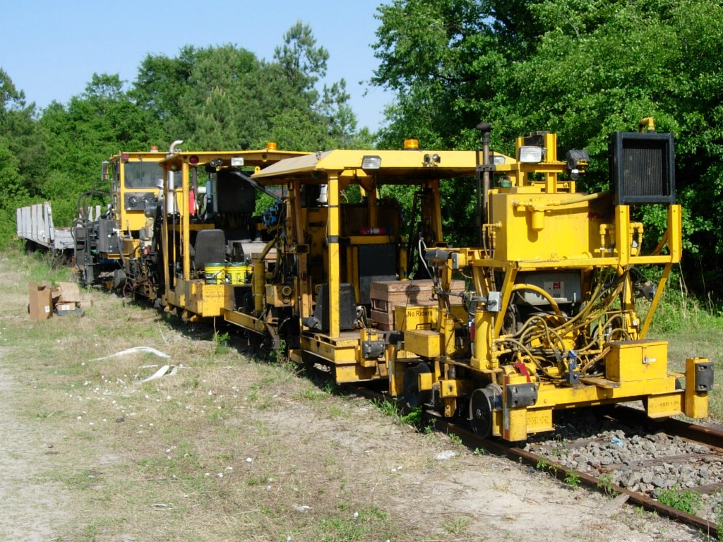 Track equipment parked in a siding near Nucor Steel