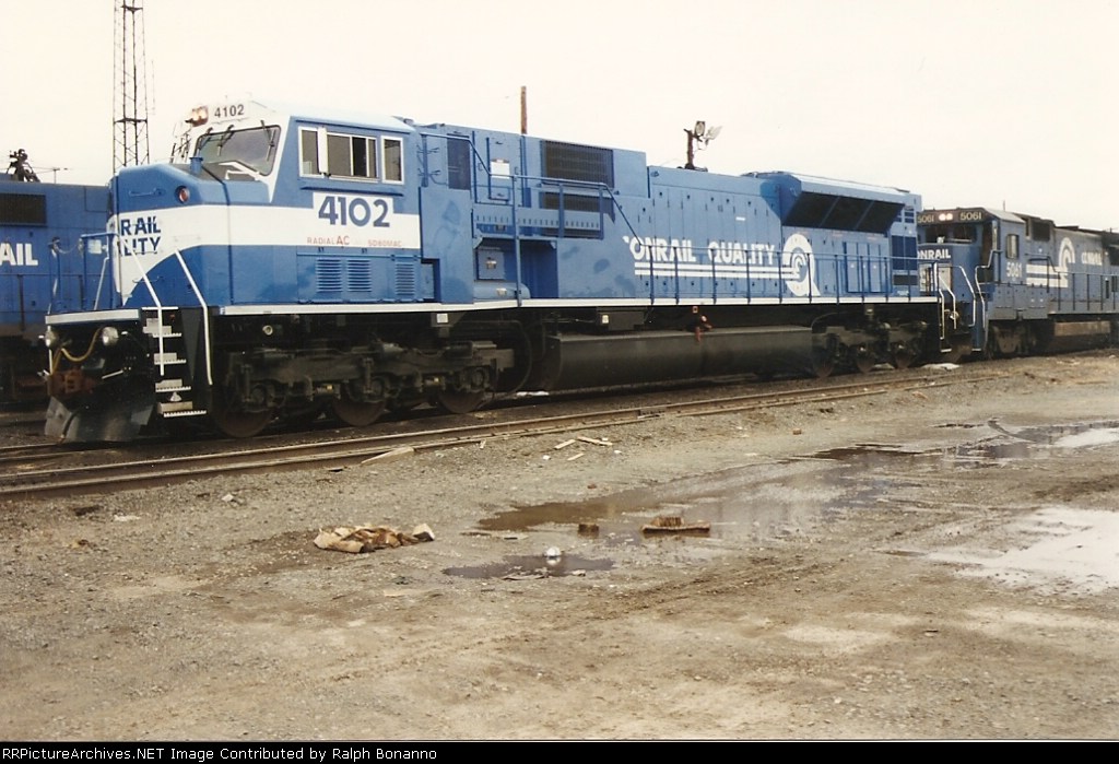 SD80MAC 4102 leads a B40-8 through the transfer yard at Oak Island