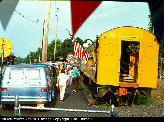 Mall at Boonton station with LIRR P54 coaches and other cars.