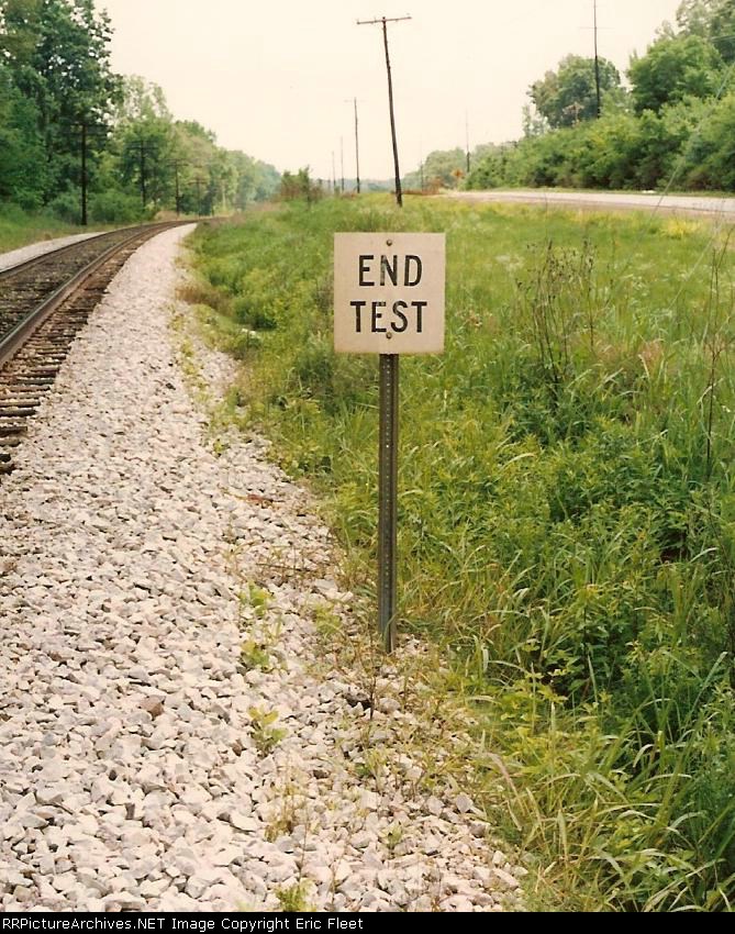 BN end test mile sign