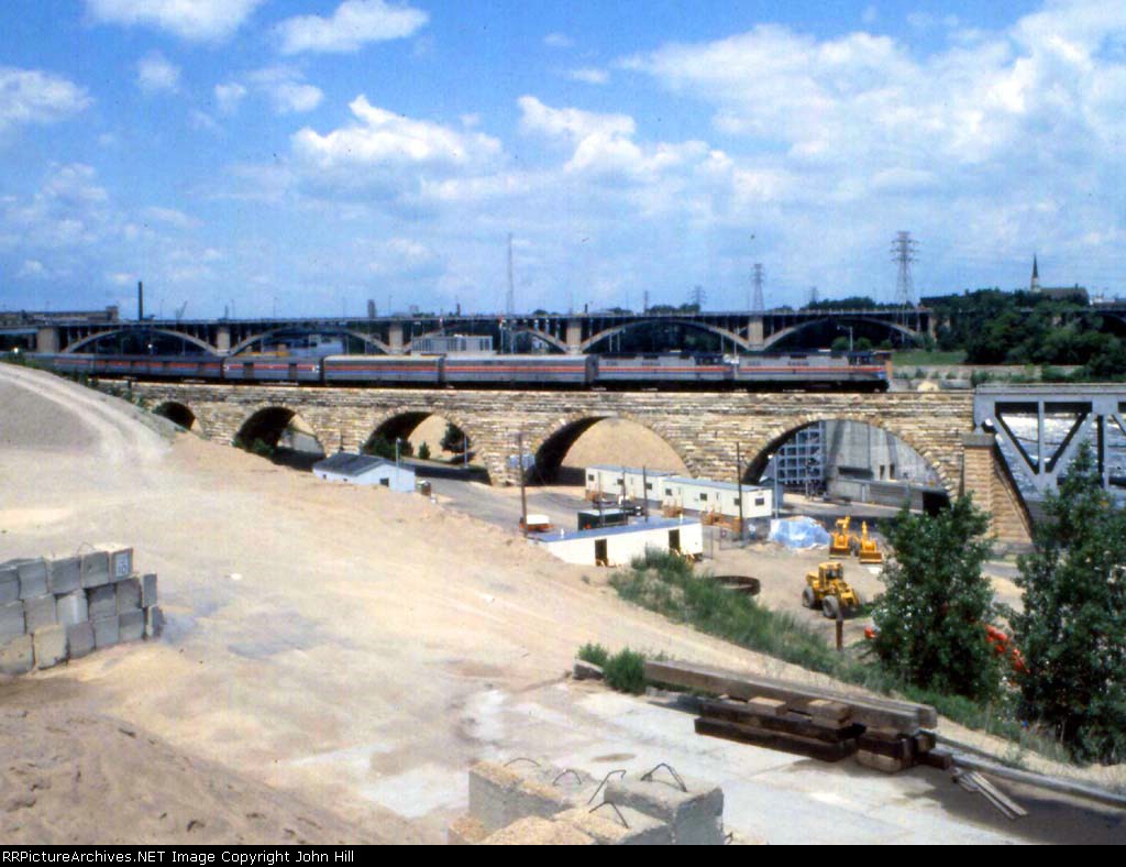 1172-14 Eastbound Amtrak North Coast Hiawatha crossing Stone Arch Bridge