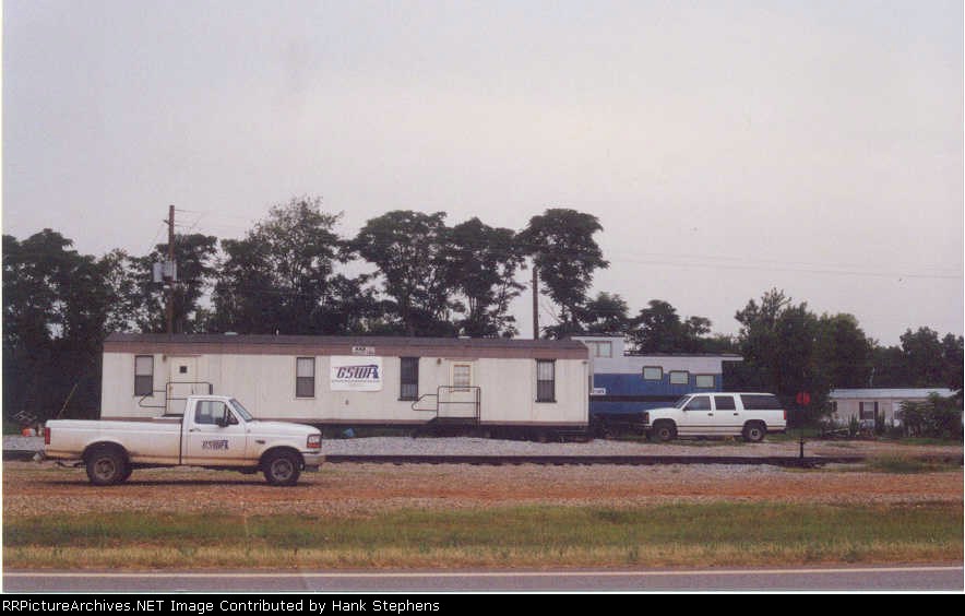 Front view of GSWR Smithville Heaquarters with GSWR vehicles