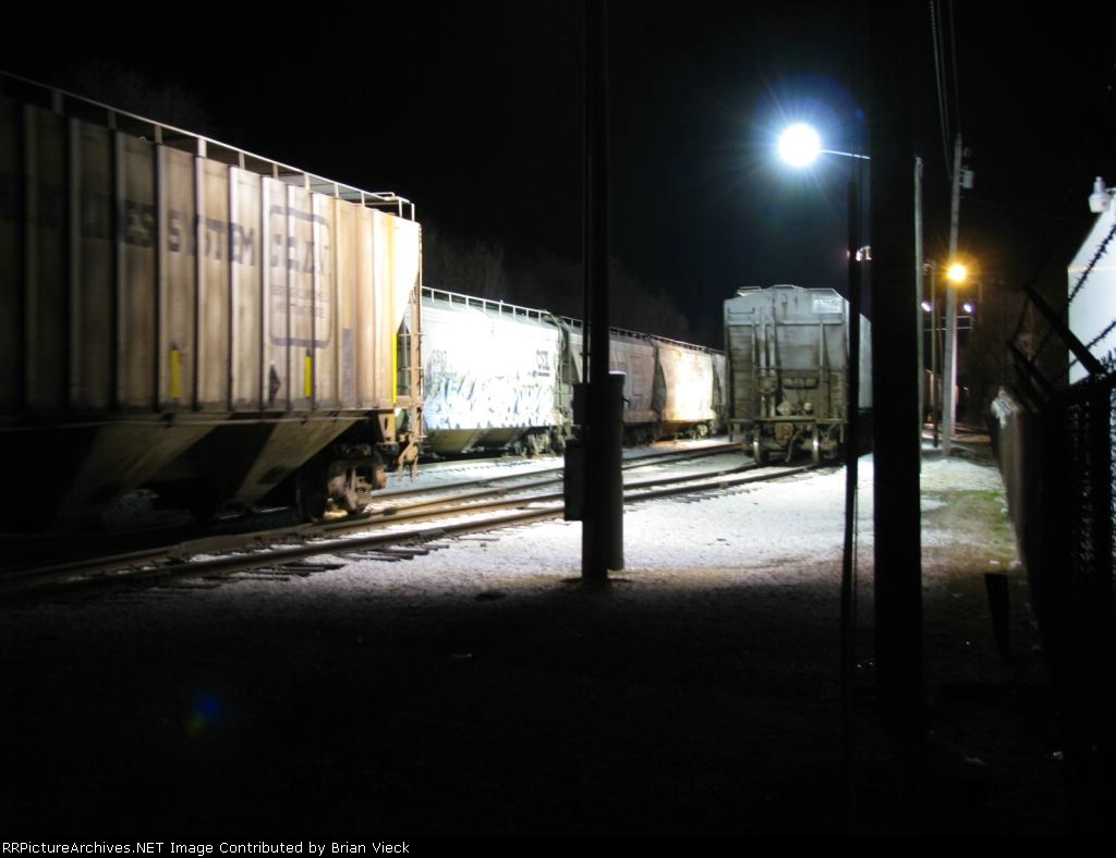 Loading a grain train at night.