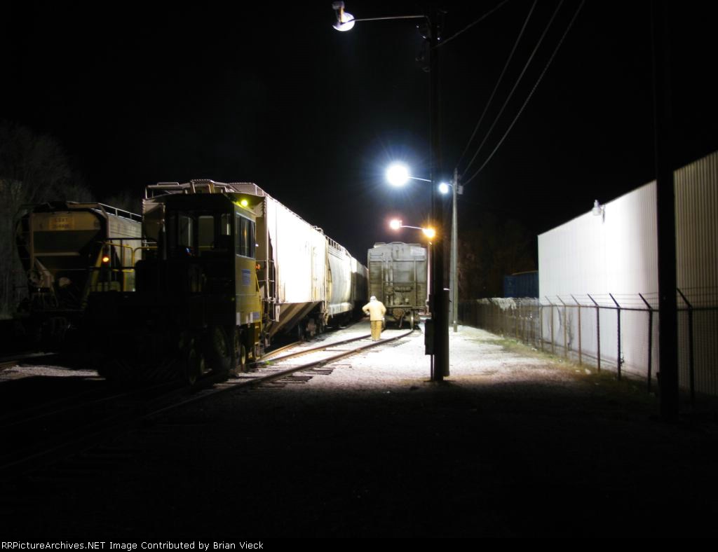 Loading a grain train at night.