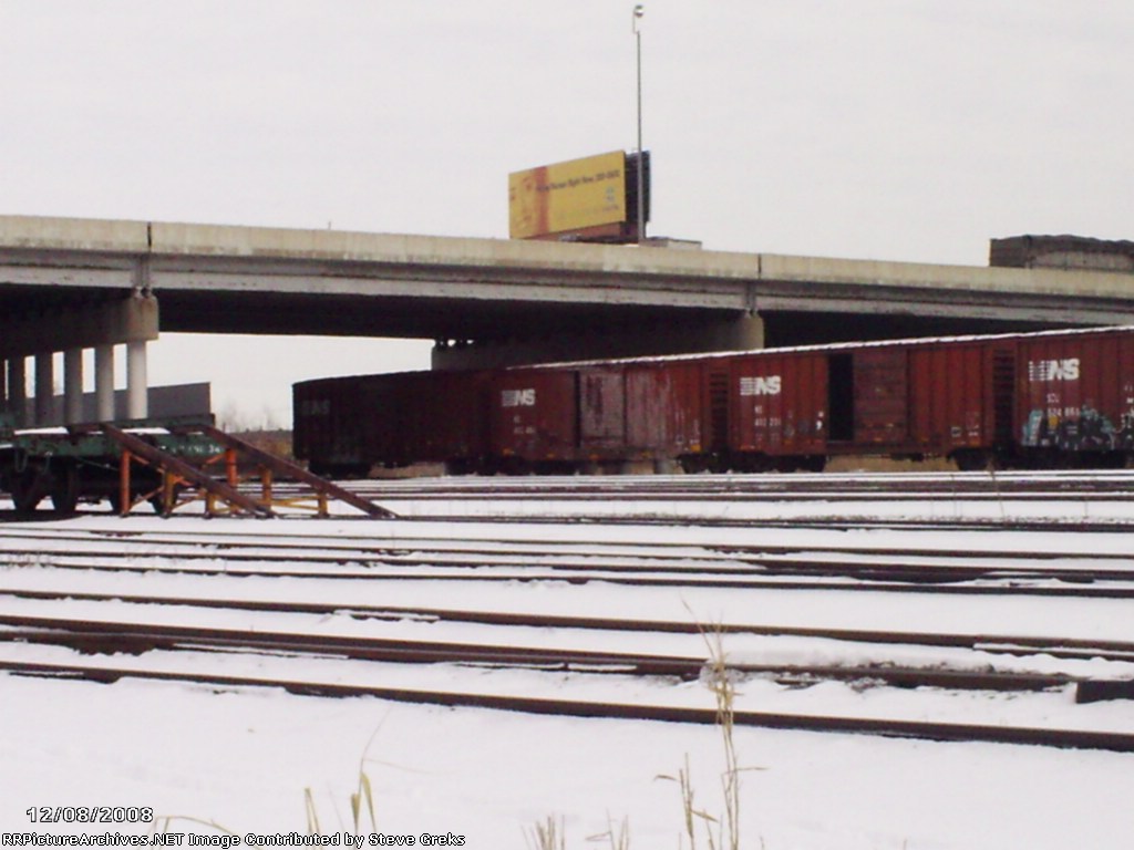 Salt Plowed from the I-190 fell on the NS stored boxcar