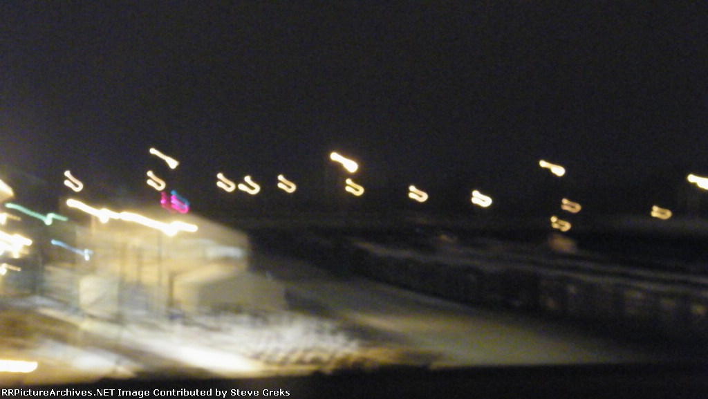 NS Stored Boxcar Yard to the Right, Colored Signals and lights at night