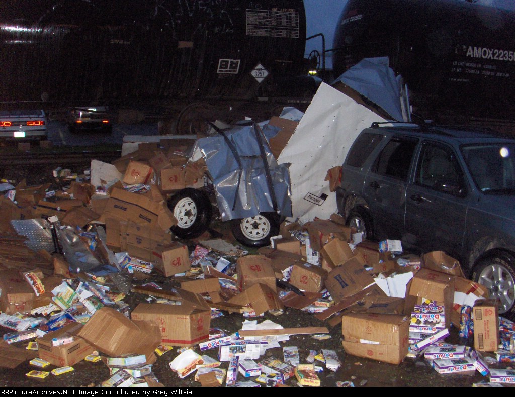 Trailer wreckage and Little Debbie boxes