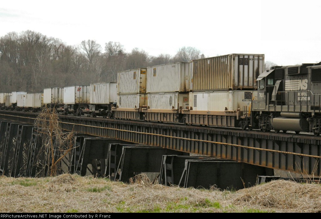 NS 7108 as last of four locos with intermodal across James River trestle