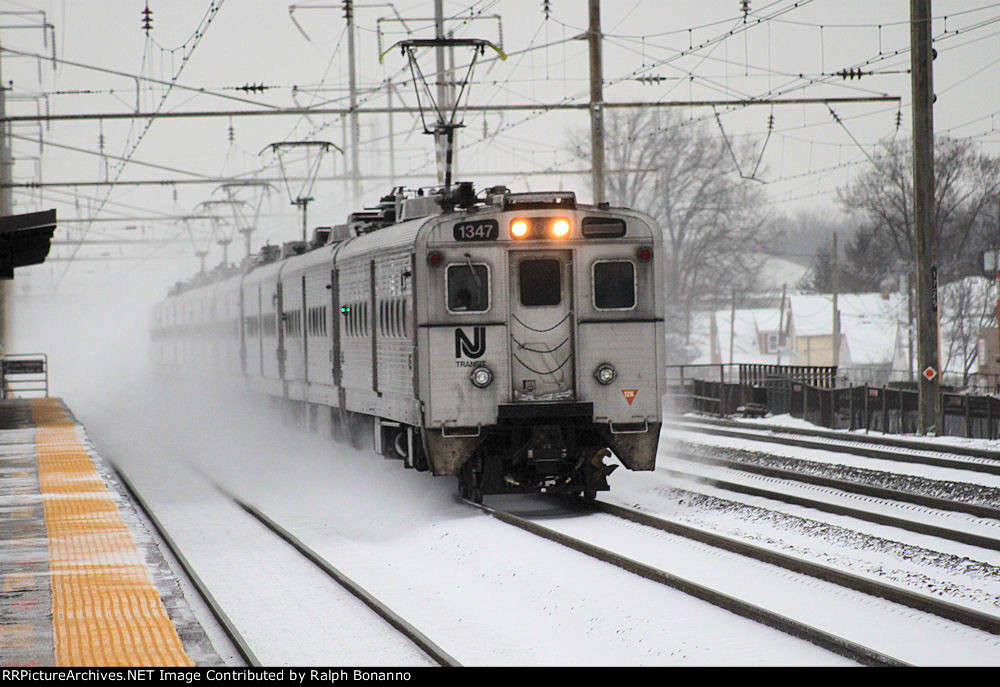 A typical NJ Transit set of Arrow III MU's flies thru the station ...