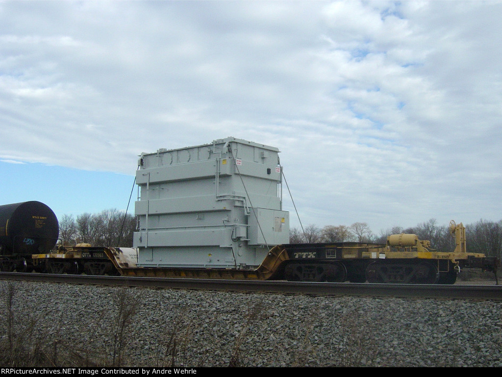 QTTX 130963 on the setout track with a transformer load
