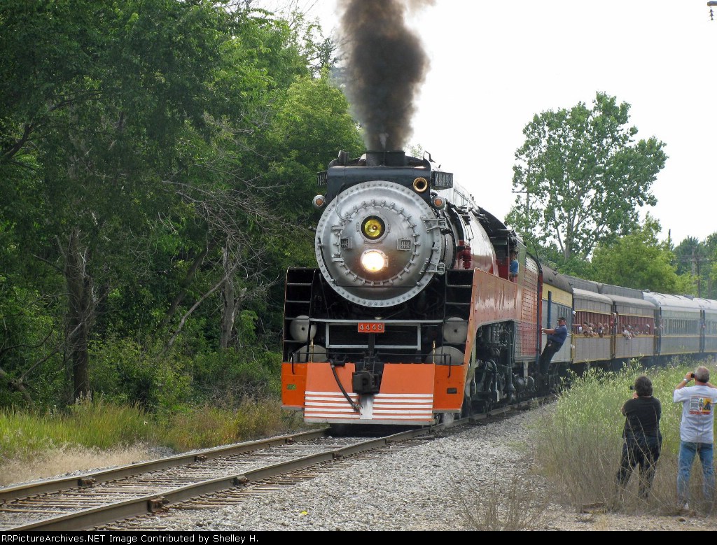 4449 approaching the crossing with some smoke!