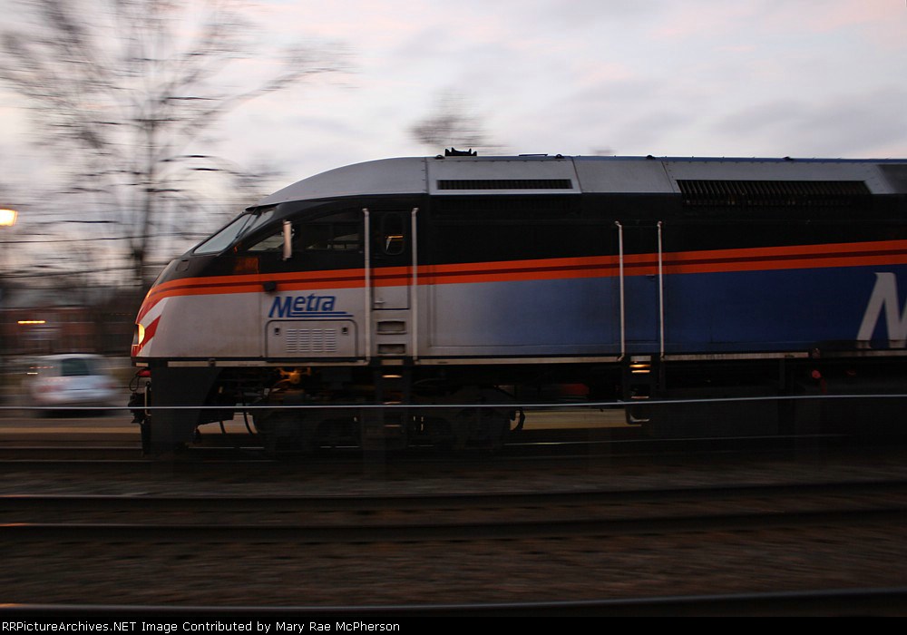 A Metra MP36 leads an outbound "Dinky"