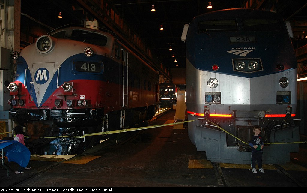 F10 sitting beside a former Amtrak P40