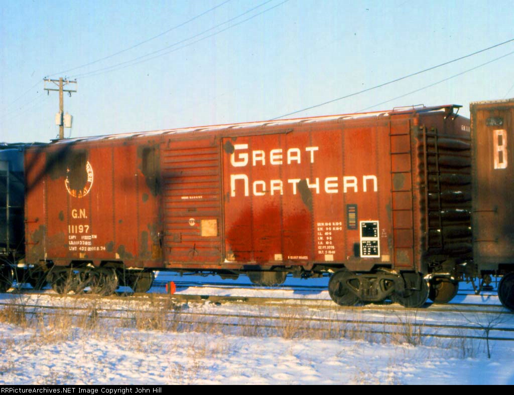 1128-17 GN 11197 on westbound C&NW freight