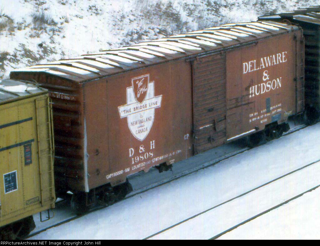 1132-37 D&H 19808 on eastbound C&NW freight at BN St. Anthony Jct.