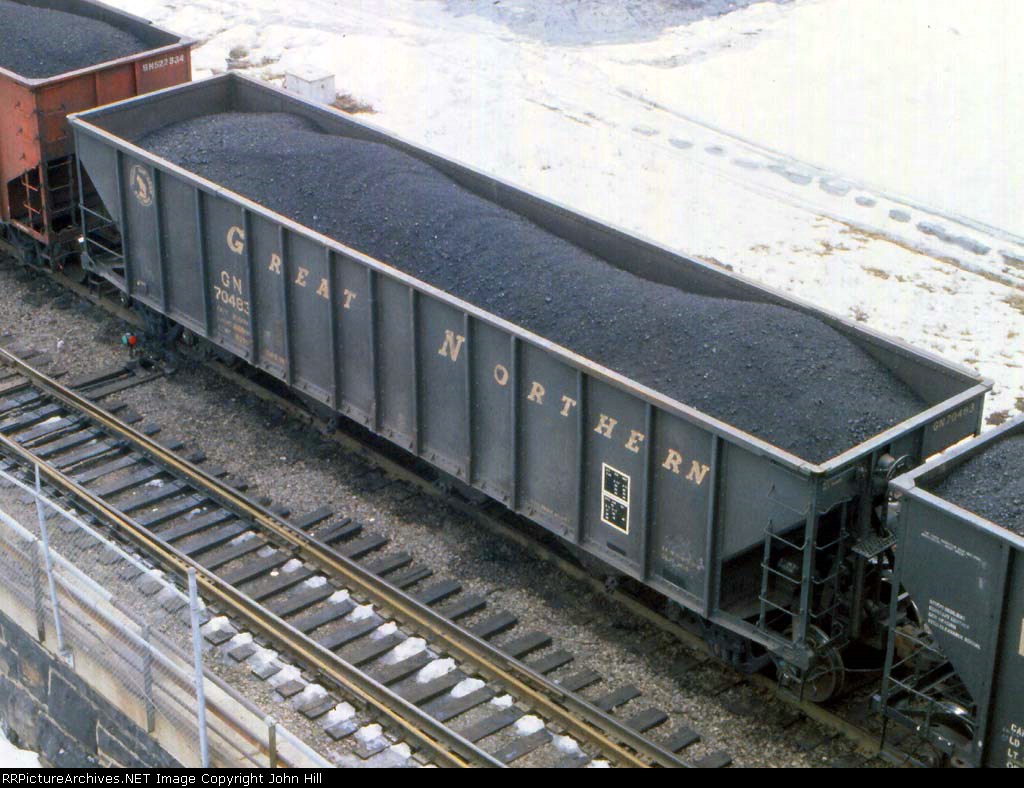 1144-12 GN 70483 on eastbound BN coal train rolling through Mpls GN Depot