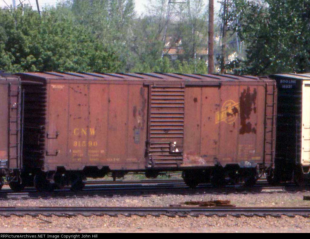 1162-21b CNW 31590 on eastbound freight passing Mpls GN Depot