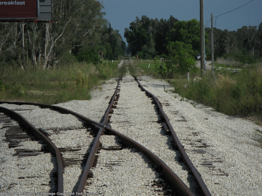 Looking south toward Granada Lakes Drive from Alico Road - AX 975.7